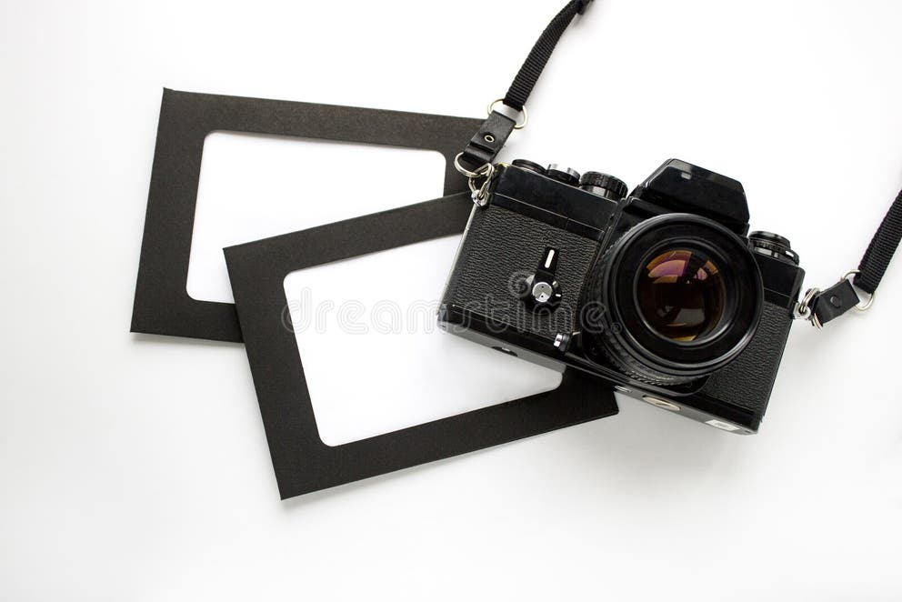 Photo frame with camera stock image. Image of snapshot - 99587027