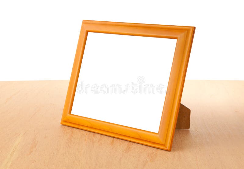 Photo frames on the table stock image. Image of room - 24776705