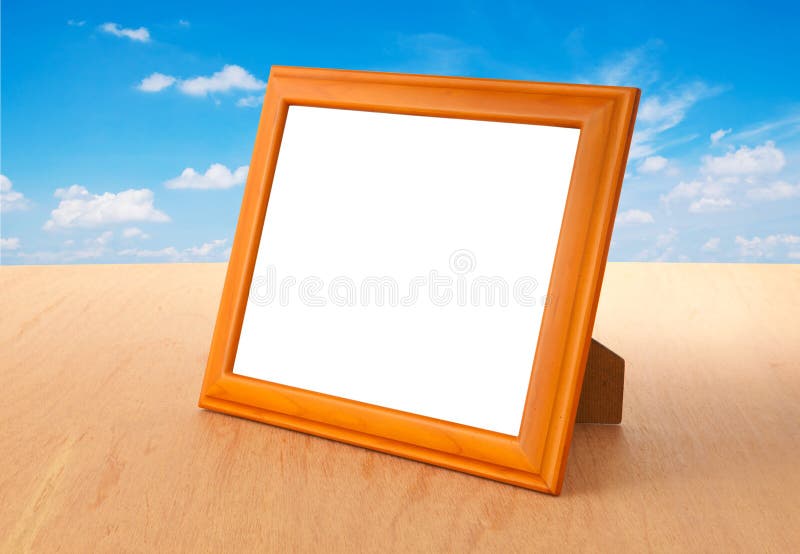Photo frames on the table stock image. Image of room - 24776705