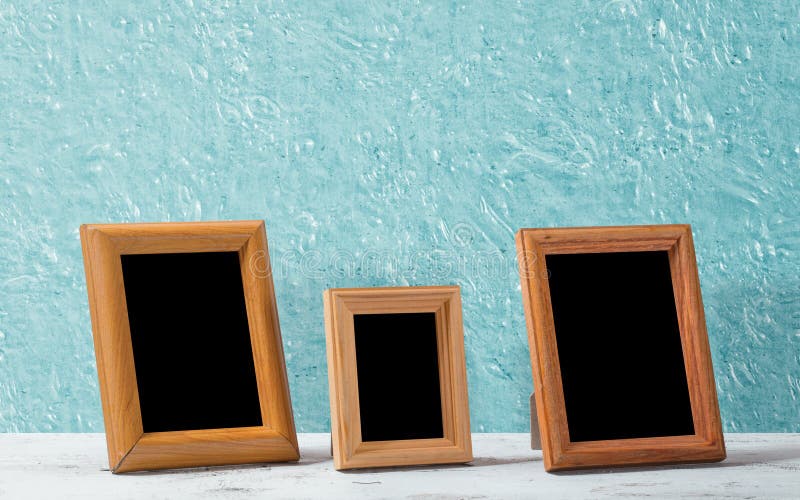Photo frames on table stock photo. Image of interior - 213529918