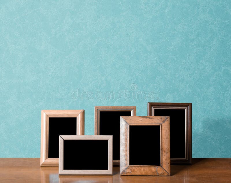 Photo frames on table stock photo. Image of aged, wood - 213530226