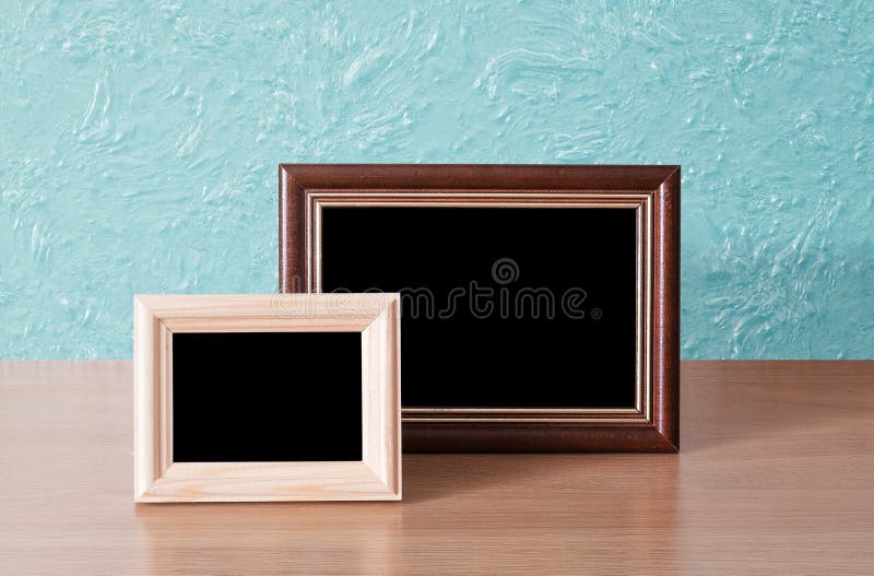 Photo frames on table stock image. Image of antique - 213530493