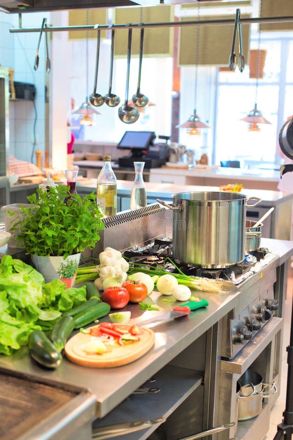 Vegetables on Counter with Utensils in Cupboard at Kitchen Stock Image ...
