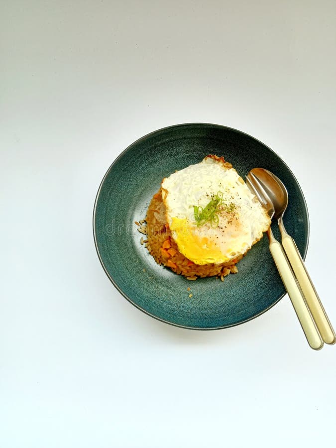 A Photo of Fried Rice with a Fried Egg on Top Stock Photo - Image of ...