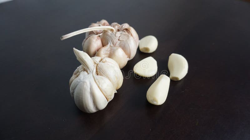 Photo of Garlic Still Intact and Already Open Stock Image - Image of ...