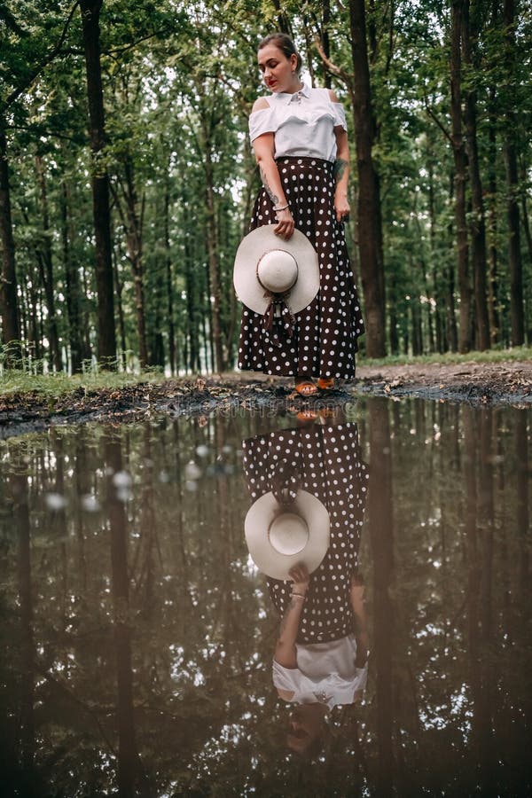 Reflection in puddle stock image. Image of rain, urban - 84572019
