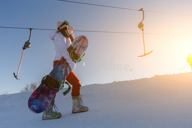 Photo of Girl with Snowboard, Stock Photo - Image of sensuality, resort ...