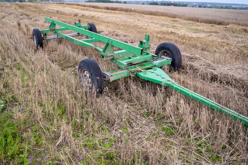 Photo of Green Trailer in Meadow. Stock Image - Image of tractor ...