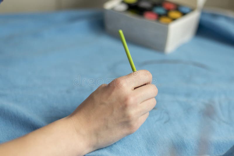 Photo of Hand with a Brush, the Process of Drawing with Colors Stock ...