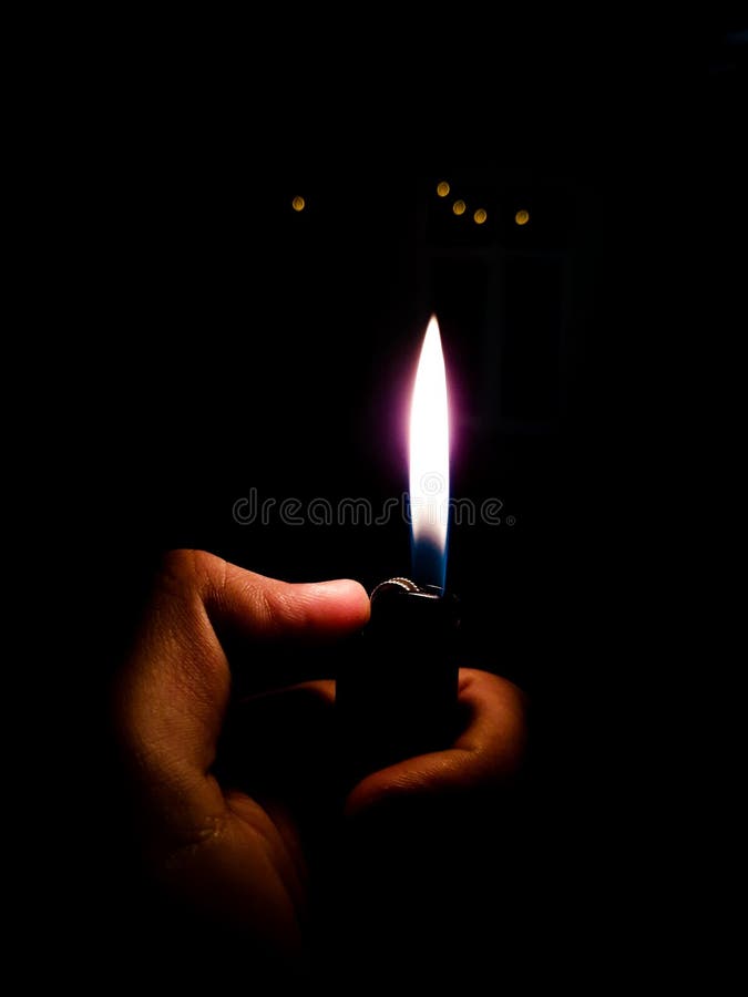 A Photo of Hand Holding a Lighter Stock Image - Image of lighting ...