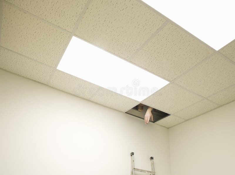 Hand Reaching from Hole in Ceiling Stock Image - Image of installation ...