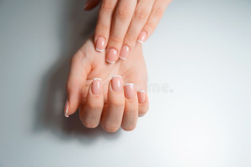 A Photo of Hands Showing Their Nails, French Nails Stock Image - Image ...