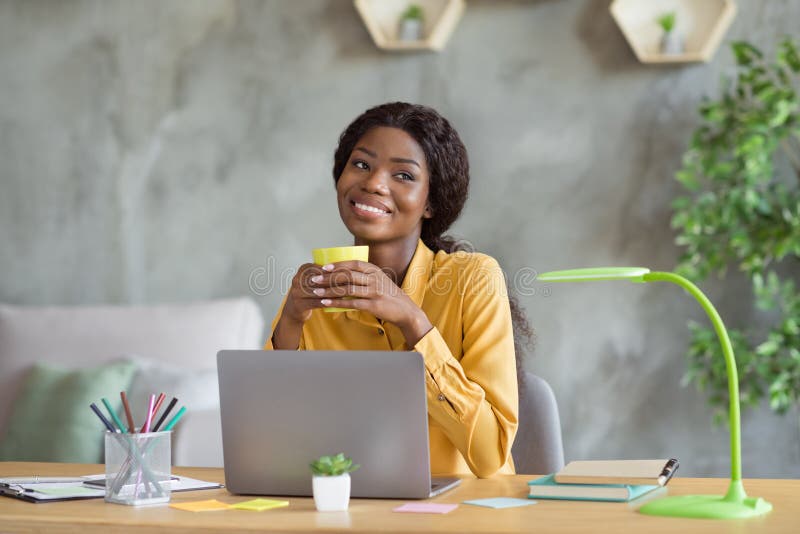 Photo Of Happy Dreamy Dark Skin Young Business Woman Sit Office Desk