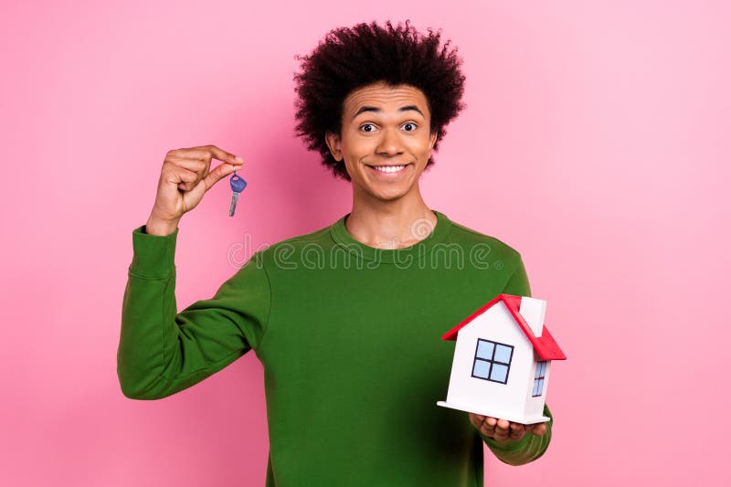 Photo of Happy Positive Guy Hold House Building Key Advertising ... Photo of Happy Positive Guy Hold House Building Key Advertising ...