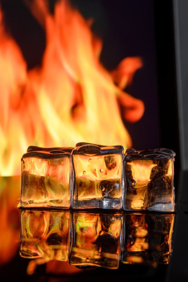 Cubes of Ice and Fire on a Water Surface on an Abstract Background 2 ...