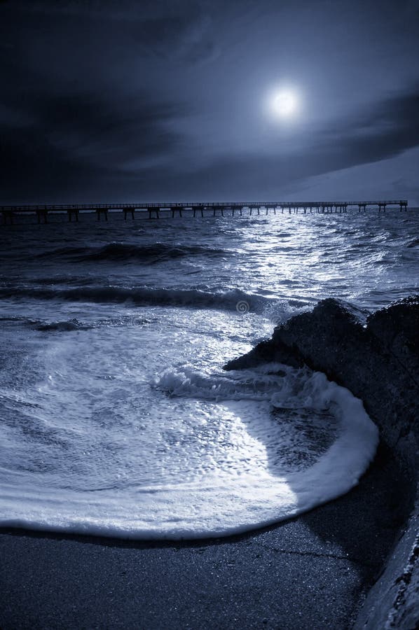 Moonlit Pier with Circular Ocean Wave Stock Image - Image of nature ...