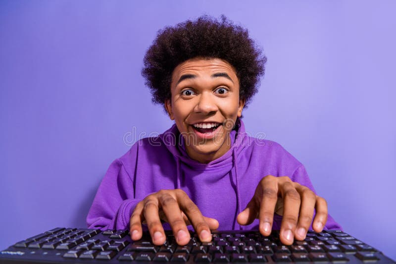 Photo of Impressed Overjoyed Guy Afro Hairdo Dressed Purple Pullover ...