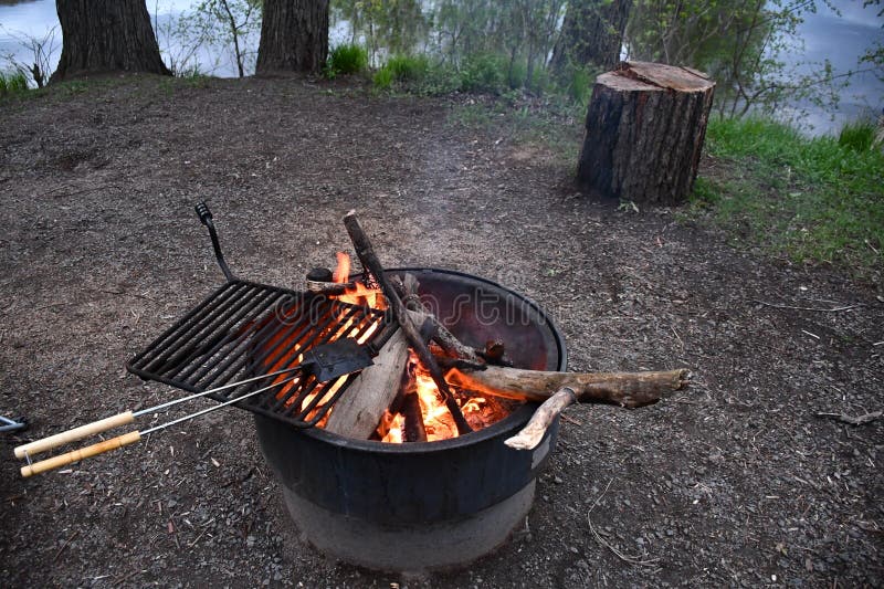 Cooking Over a Campfire with Lake in Background at Interstate State ...