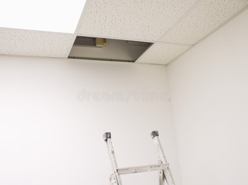 Ladder in Below Open Ceiling Panel in Empty Office Stock Photo - Image ...