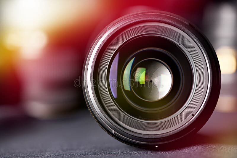 Photo Lens Front View on Blurred Texture Stock Photo - Image of black ...