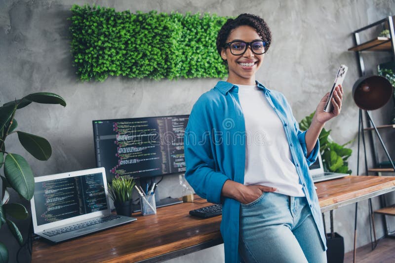 Photo of Lovely Young Lady Hold Device Coding Monitors Dressed Blue ...