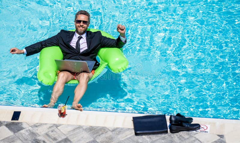 Photo of Man Trader Work and Relax in Pool with Laptop, Advertisement ...