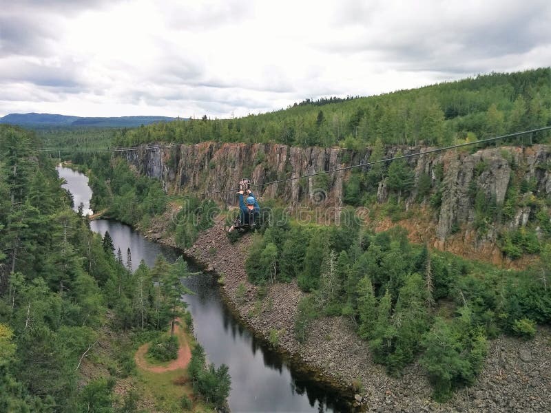 Man Zip Lining stock photo. Image of face, activities - 173948874