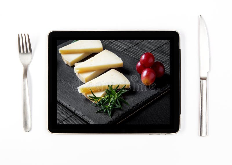 Photo Manchego Cheese with Grapes on Tablet Indoors Stock Image - Image ...