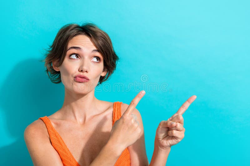 Photo Of Minded Woman With Bob Hair Dressed Knitwear Singlet Indicating