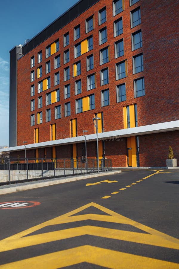 Photo of Modern Red Brick Wall Commercial Building. Stock Photo - Image ...