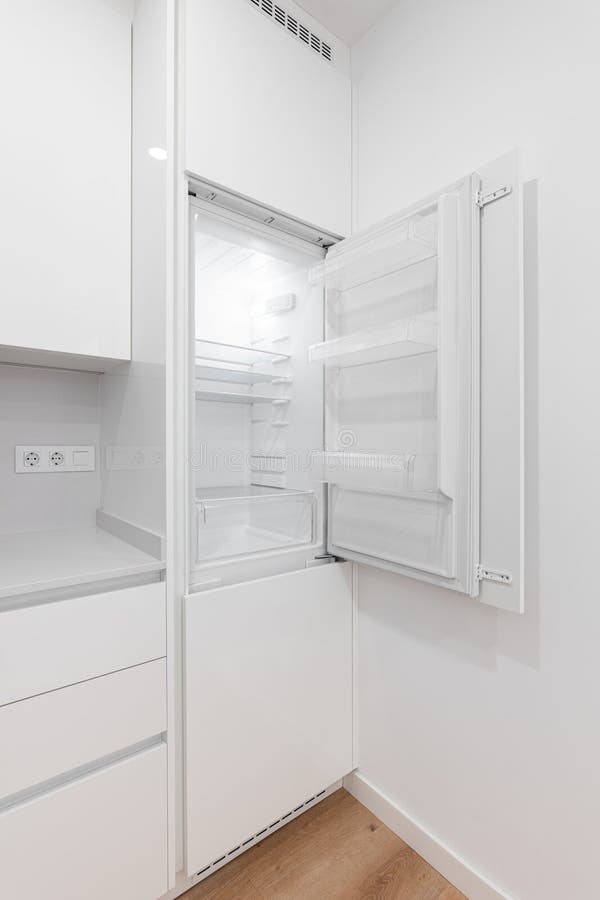 Photo of a Modern White Refrigerator Freezer in a Contemporary Kitchen ...