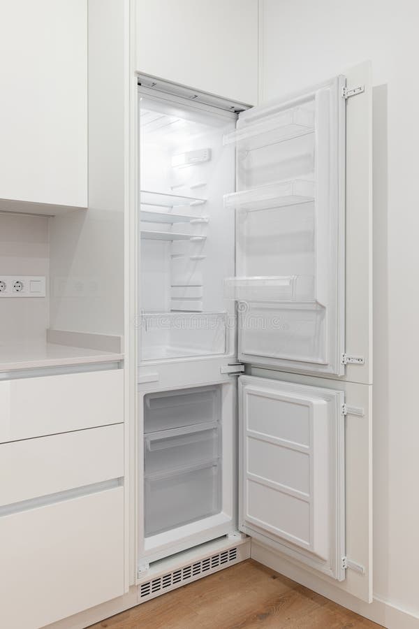 Photo of a Modern White Refrigerator Freezer in a Contemporary Kitchen ...