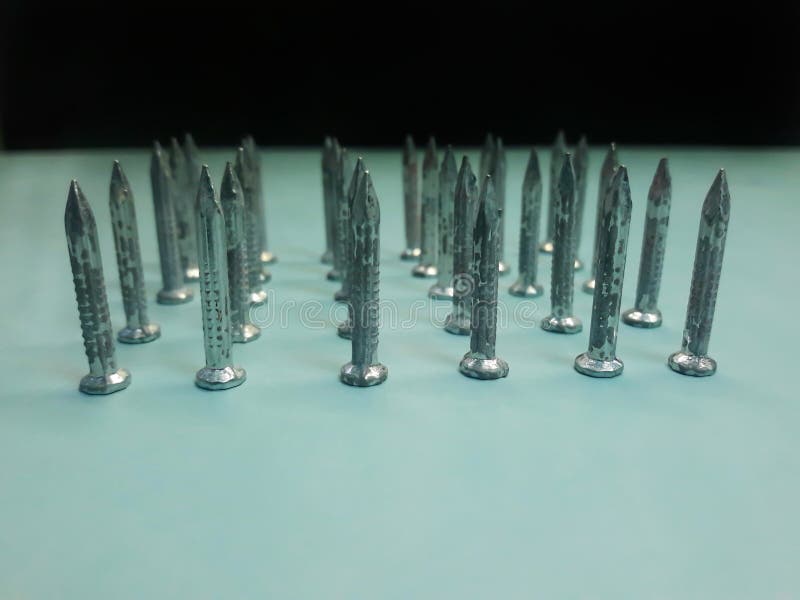 Photo of Nails on a Blue Table Stock Image - Image of screenshot, green ...