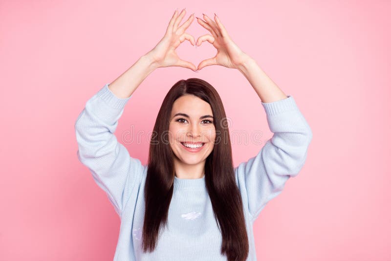Photo Of Nice Optimistic Long Hairdo Brunette Lady Show Heart Wear Blue