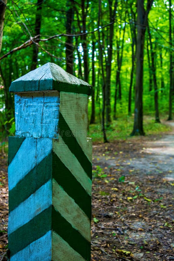 Photo of an Old Boundary Post in a Green Forest Stock Image - Image of ...