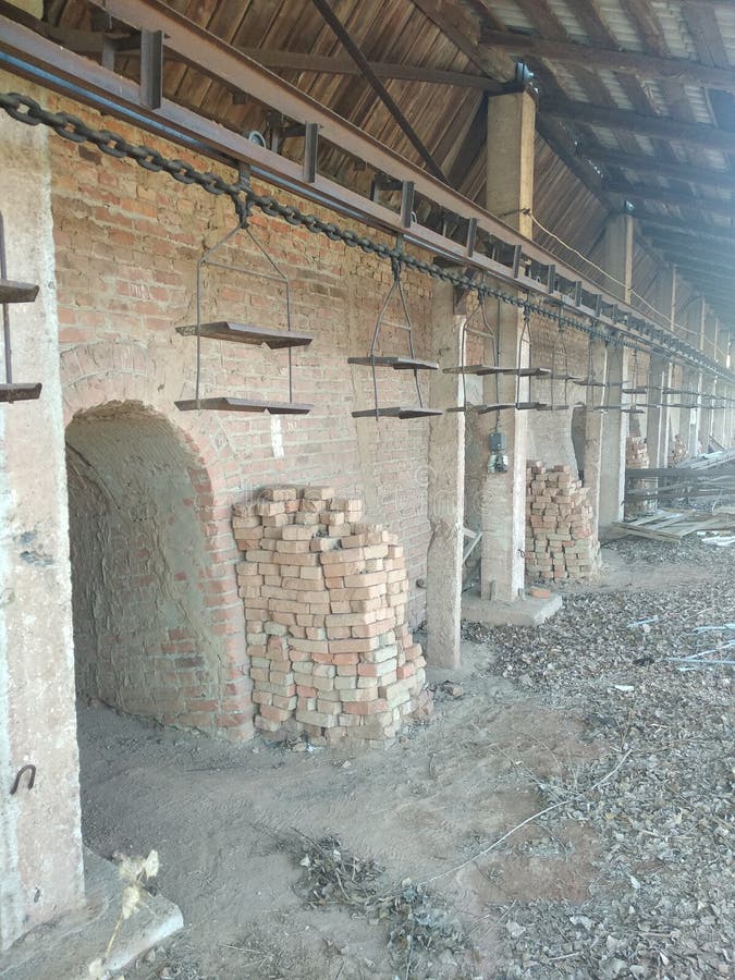 Photo Old Brick Factory, Abandoned Building with Stacks of Old Bricks ...