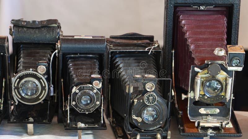Photo the Old Photo Cameras. Antique Folding Cameras Editorial Image ...