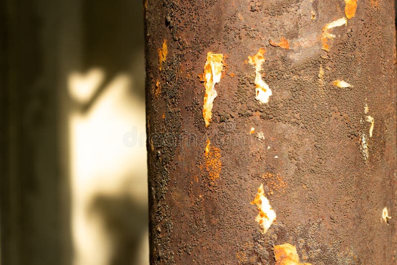 Photo Old Rusty Pipe Pole with the Remains Stock Photo - Image of ...
