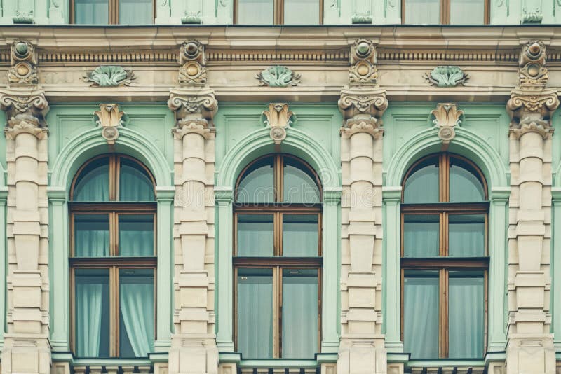 Photo of Olive Wall and Windows of Classical Building Facade in Rome ...