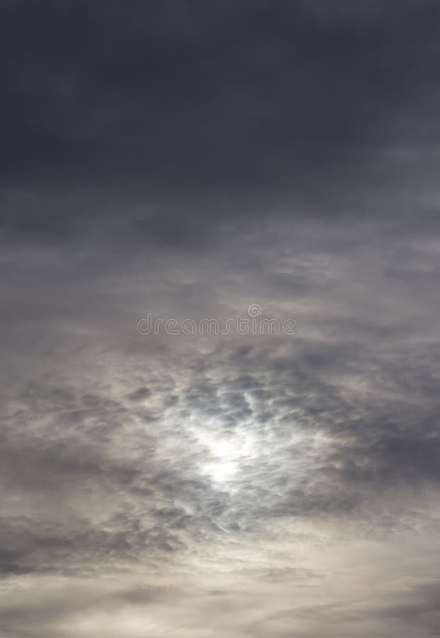 Photo of Overcast Sky with Sun through Stormy Clouds Stock Photo ...