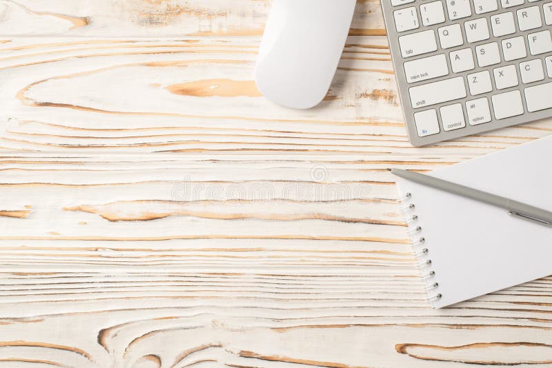 Photo Overhead of Keyboard Notepad Pen Computer Mouse on the Wood Table ...
