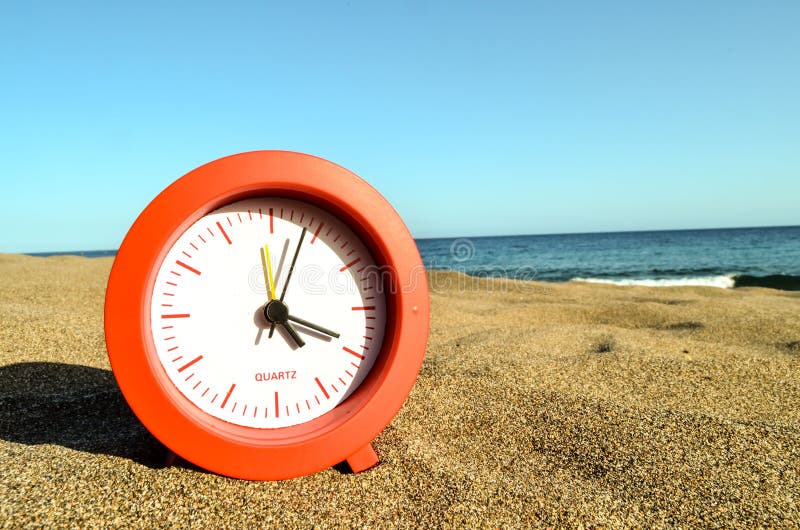 Clock on the Sand Beach stock image. Image of summer - 145160851