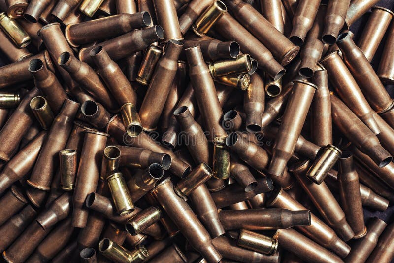 Photo of a Pile of Copper Colored Bullet Shells Stock Image - Image of ...