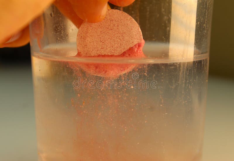 Electrolyte Tab Dissolving in Water Stock Image - Image of lighting ...