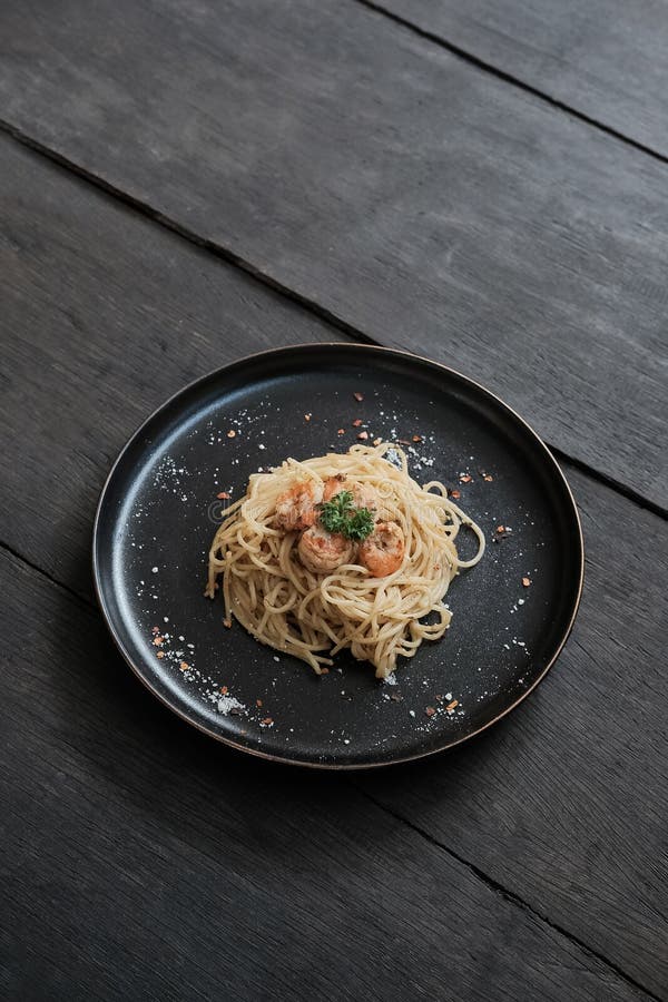 A Plate of Spaghetti with Marinara Sauce and Fresh Basil, Isolated on a ...