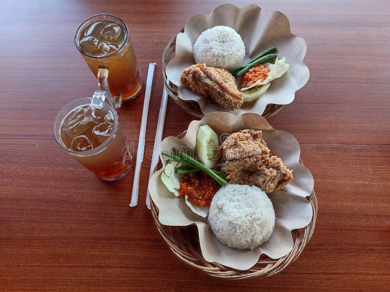 Photo of 2 Portions of Fried Chicken and Iced Tea Stock Photo - Image ...