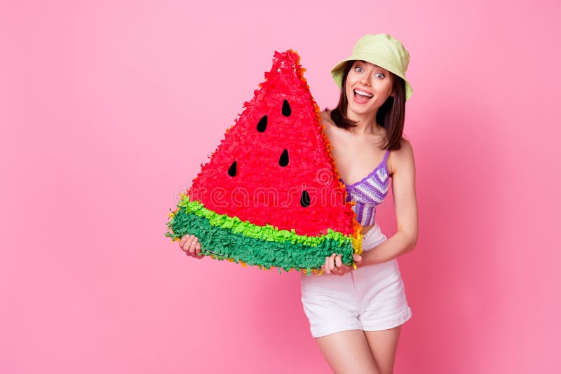 Photo Portrait of Pretty Young Woman Hold Paper Pinata Watermelon Slice ... Photo Portrait of Pretty Young Woman Hold Paper Pinata Watermelon Slice ...