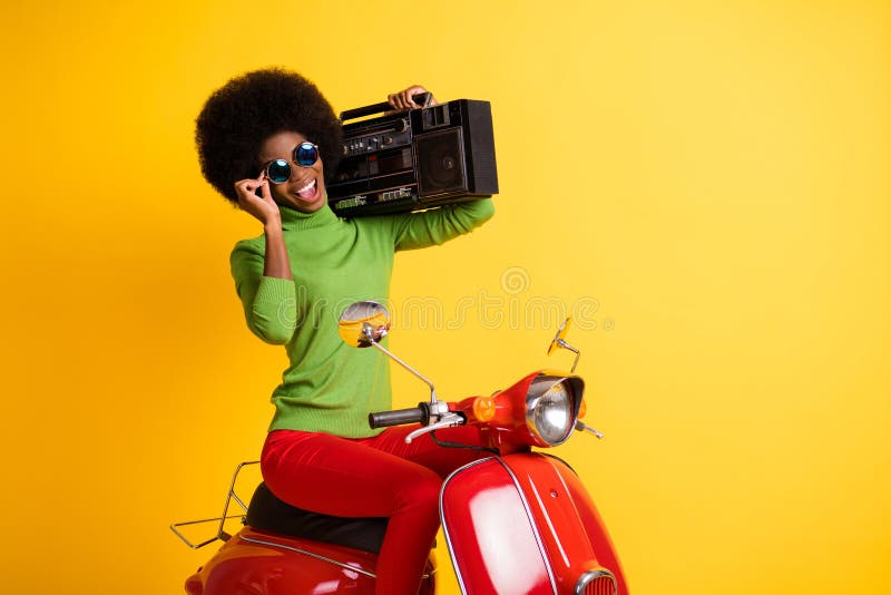 Photo Portrait Of Stylish Biker Driving Red Motorbike Holding Boombox Touching Glasses Isolated