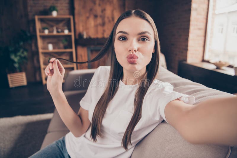 Photo Of Pretty Adorable Young Woman White T Shirt Sitting Couch