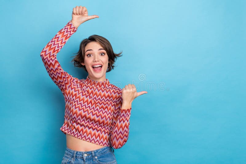 Photo Of Pretty Excited Woman Dressed Striped Top Showing Two Thumbs